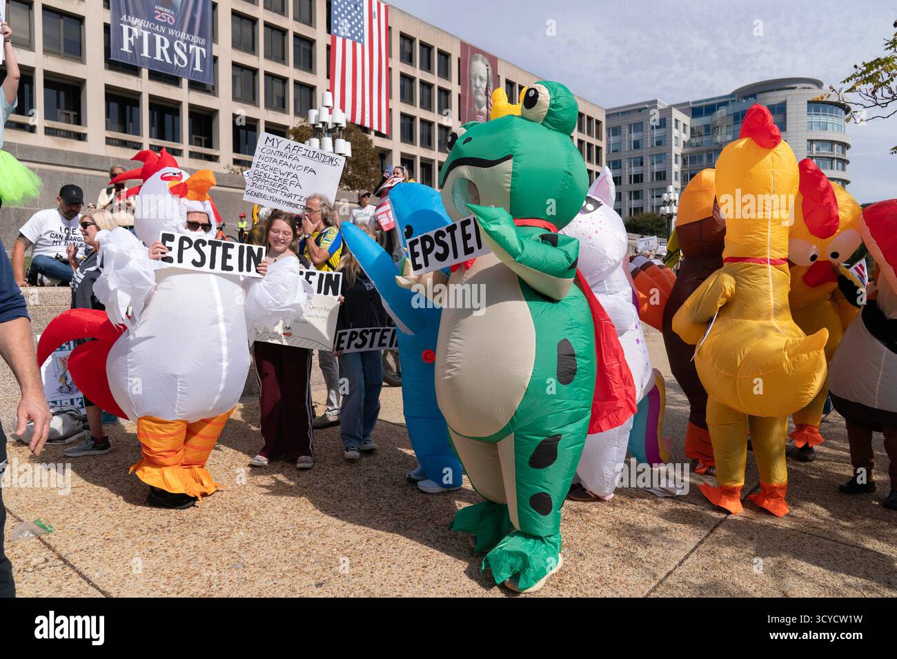 Demonstrator in inflatable costumes rally on Pennsylvania Avenue during ...