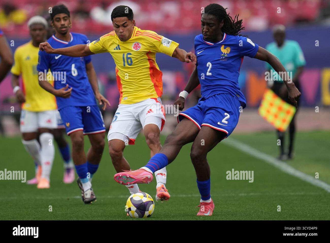 Colombia's Joel Romero (16) and France's Ilane Toure battle for the ...