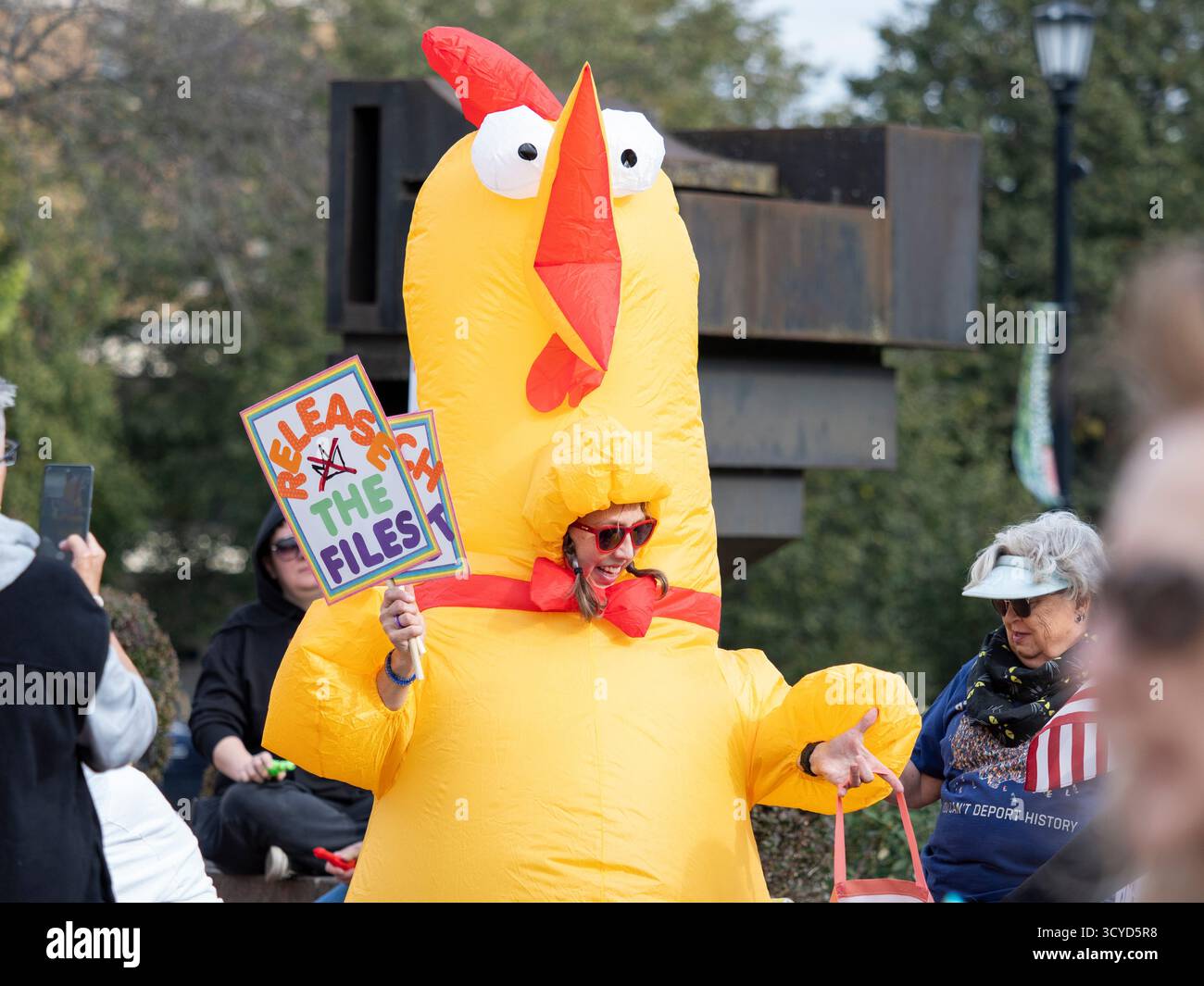 SOUTH BEND, IN - OCTOBER 18: A protested dressed up as a chicken speaks ...
