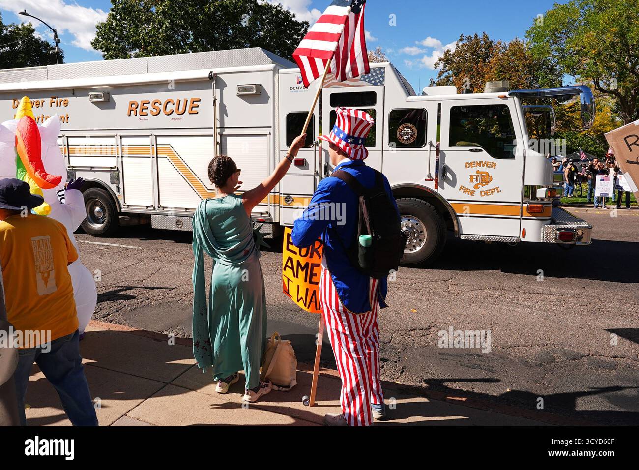 Amber Wright, left, dressed as Lady Liberty, and Nathaniel Roling ...