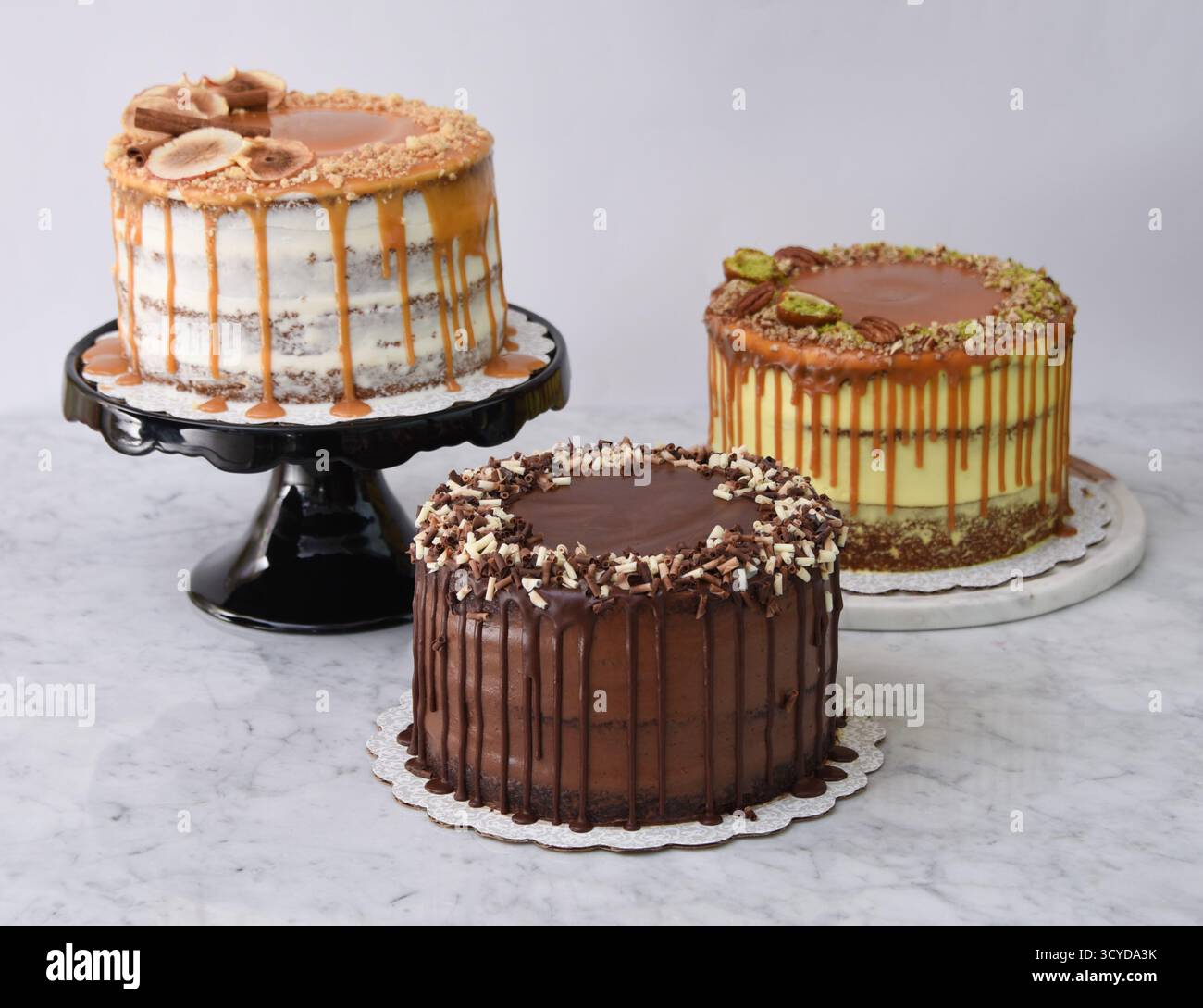 Assorted Gourmet Cakes including Caramel Fig, Pistachio Caramel, and ...
