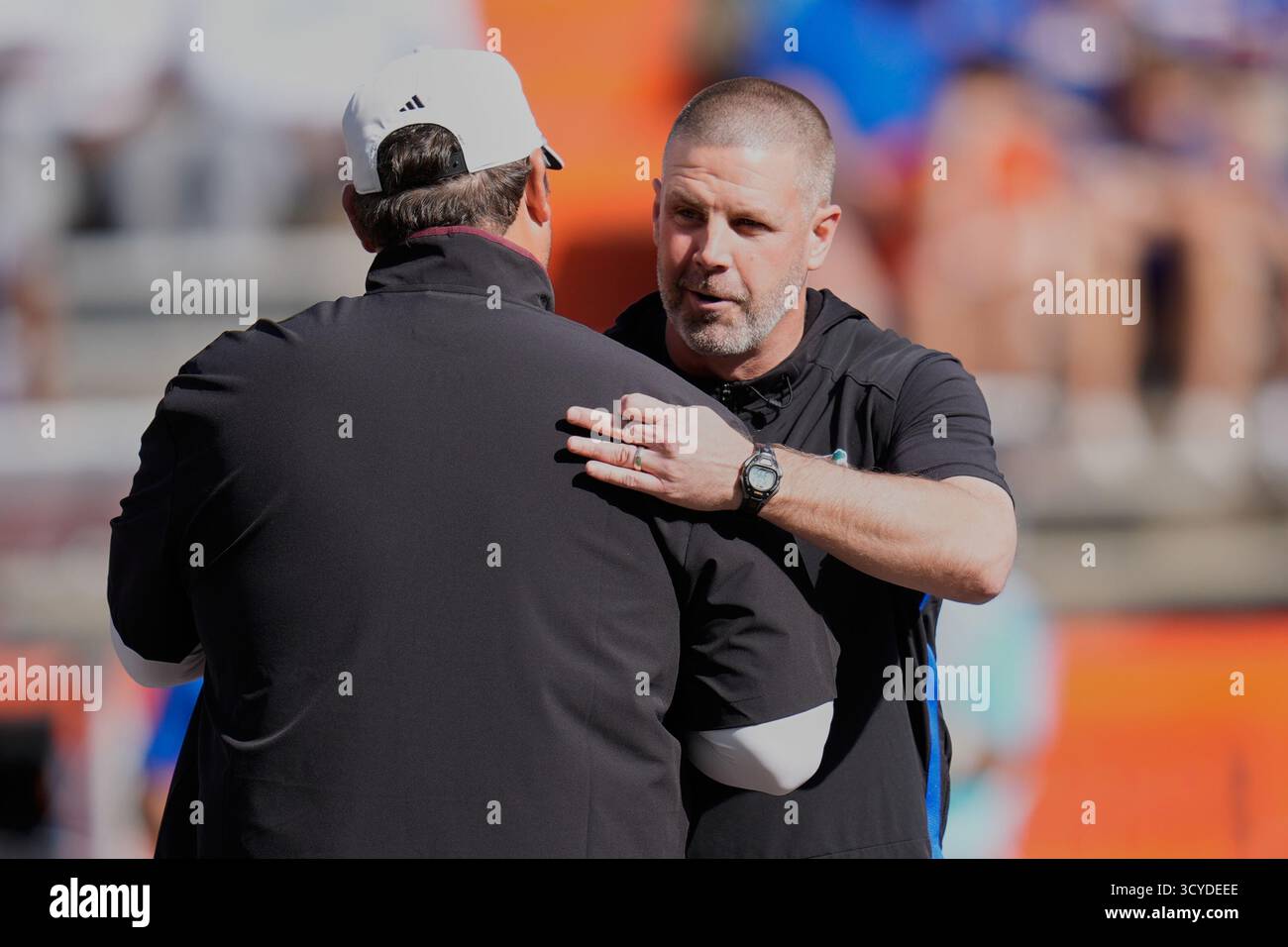 Mississippi State head coach Jeff Lebby, left, and Florida head coach ...