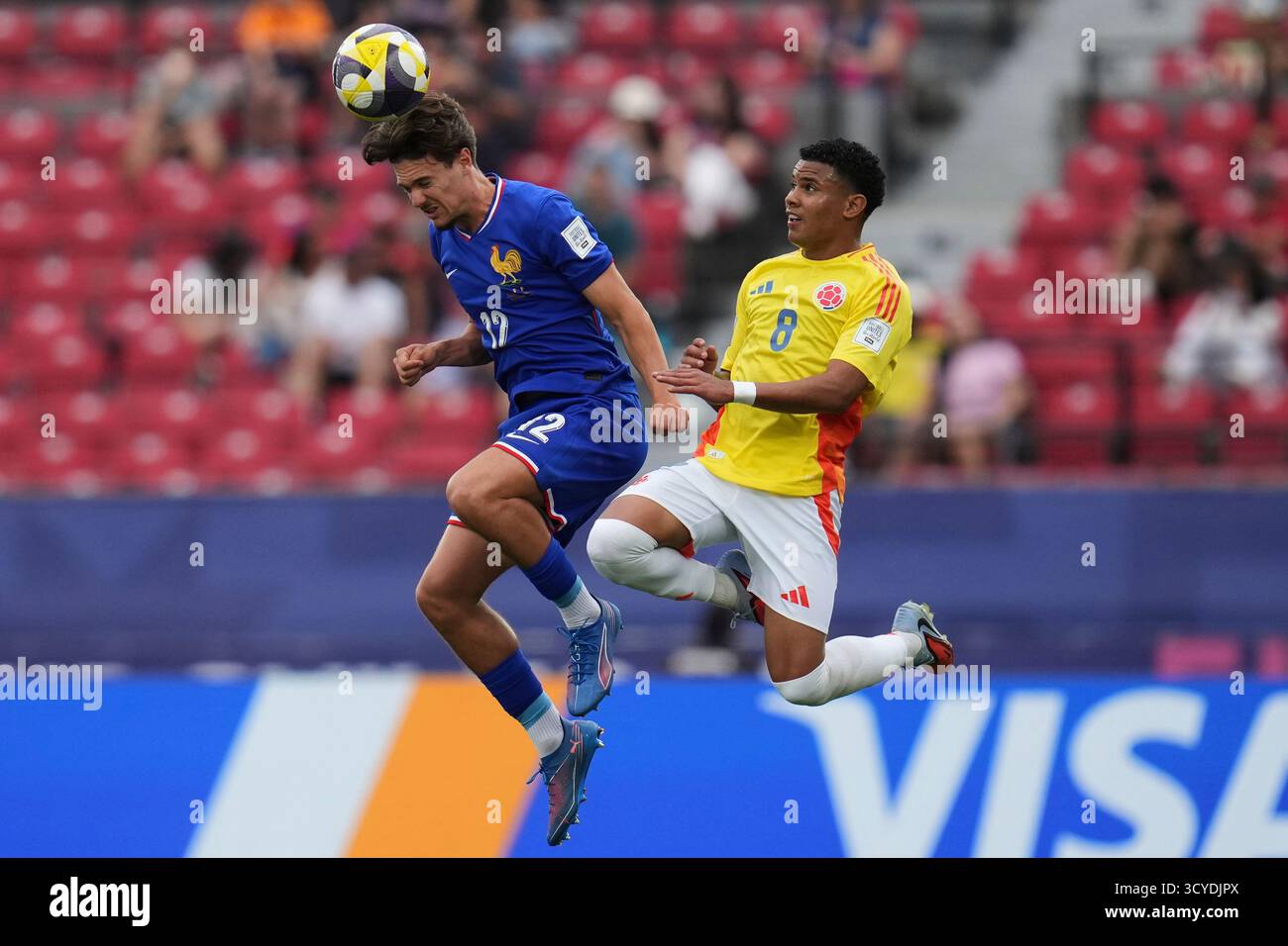 France's Anthony Bermont (12) and Colombia's Royner Benitez go for a ...