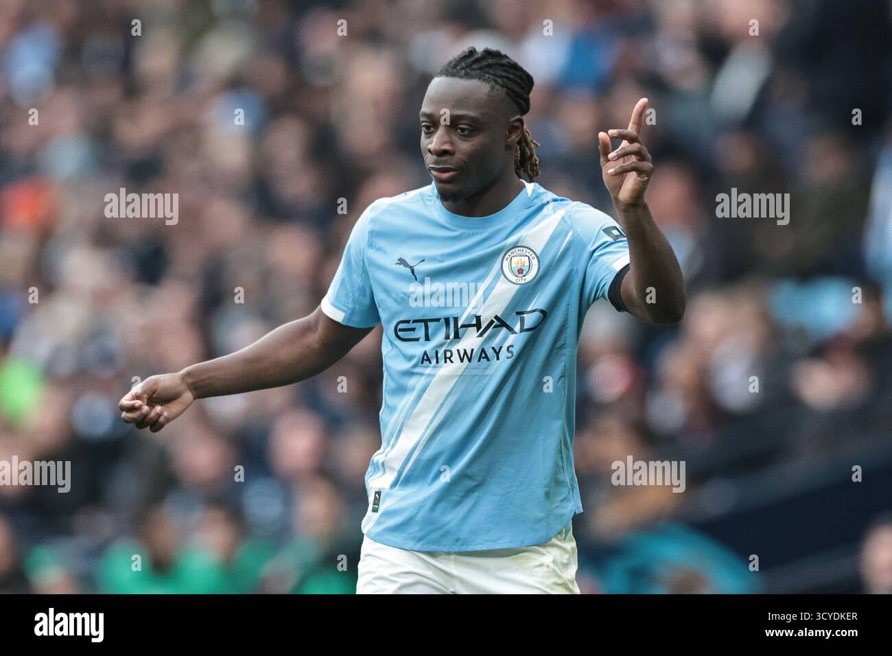 Jeremy Doku of Manchester City gives his team instructions during the ...