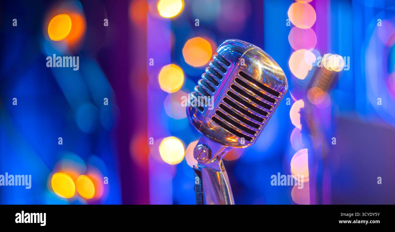 retro microphone in tv studio during filming and broadcasting of shows ...