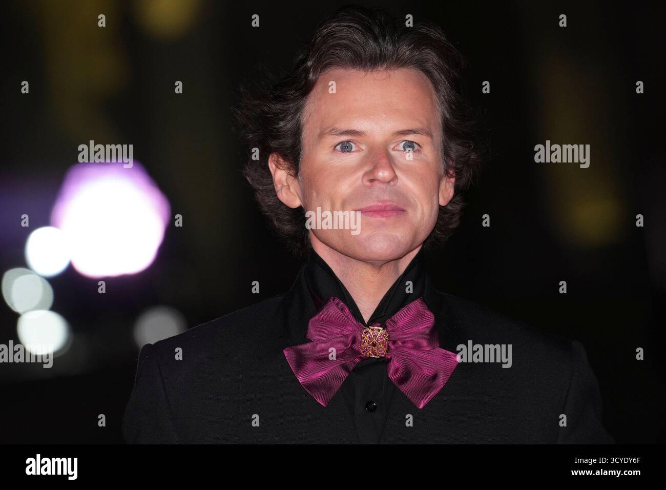 Christopher Kane poses for photographers upon arrival at the British ...
