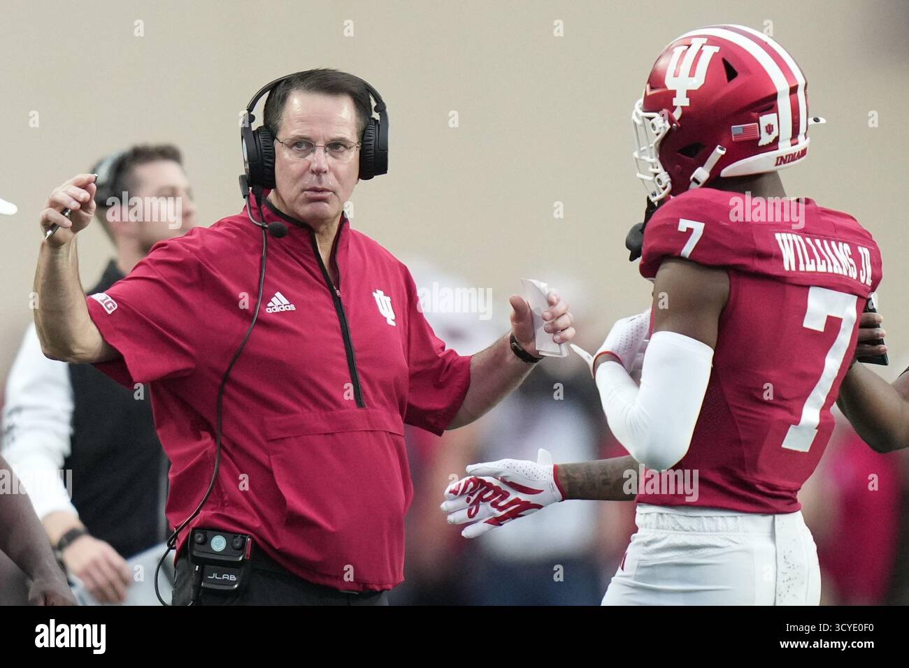 Indiana head coach Curt Cignetti talks with wide receiver E.J. Williams ...
