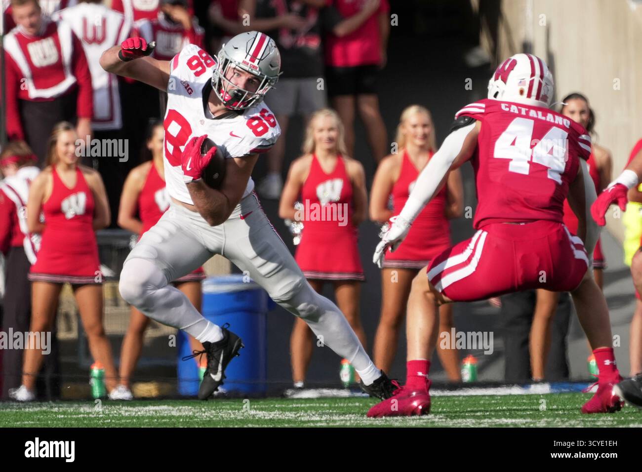 Ohio State's Max Klare catches a pass in front of Wisconsin's Cooper ...