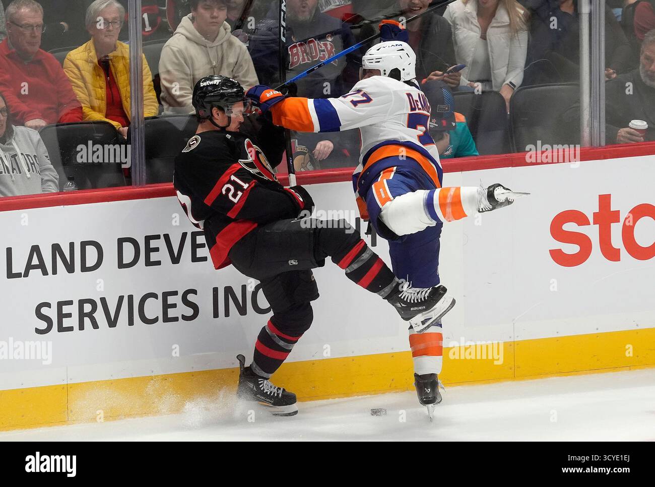 New York Islanders defenceman Tony Deangelo (77) collides with Ottawa ...