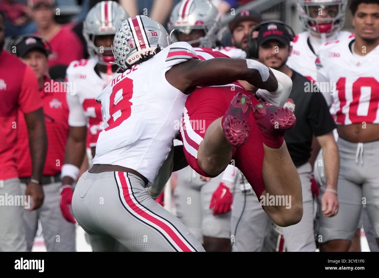 Ohio State's Arvell Reese stops Wisconsin's Lance Mason after a catch ...