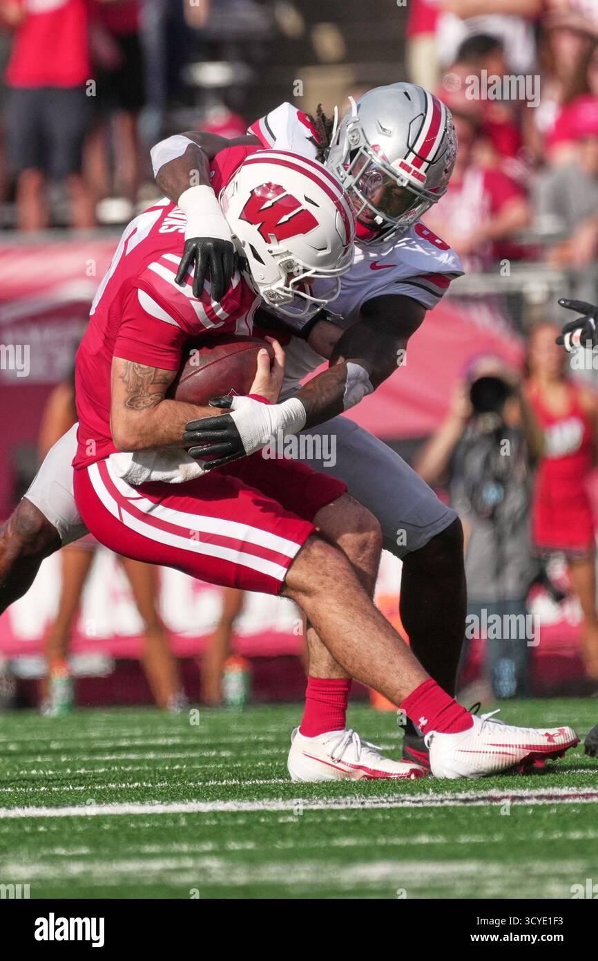 Ohio State's Arvell Reese sacks Wisconsin's Hunter Simmons during the ...