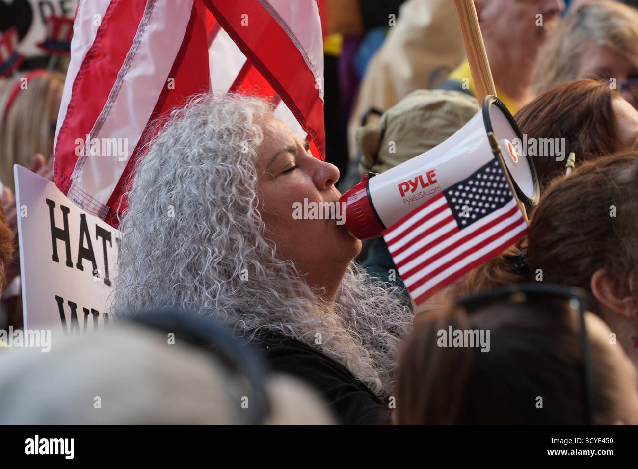 A woman attends a No Kings protest in downtown Pittsburgh Saturday, Oct ...