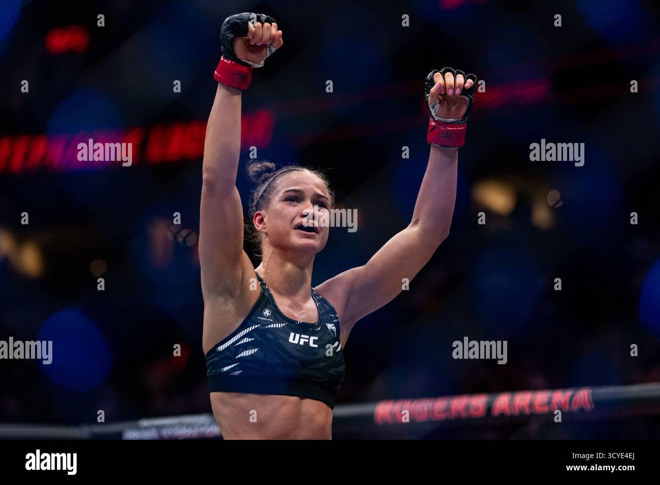 Stephanie Luciano celebrates after defeating Ravena Oliveira in a women ...