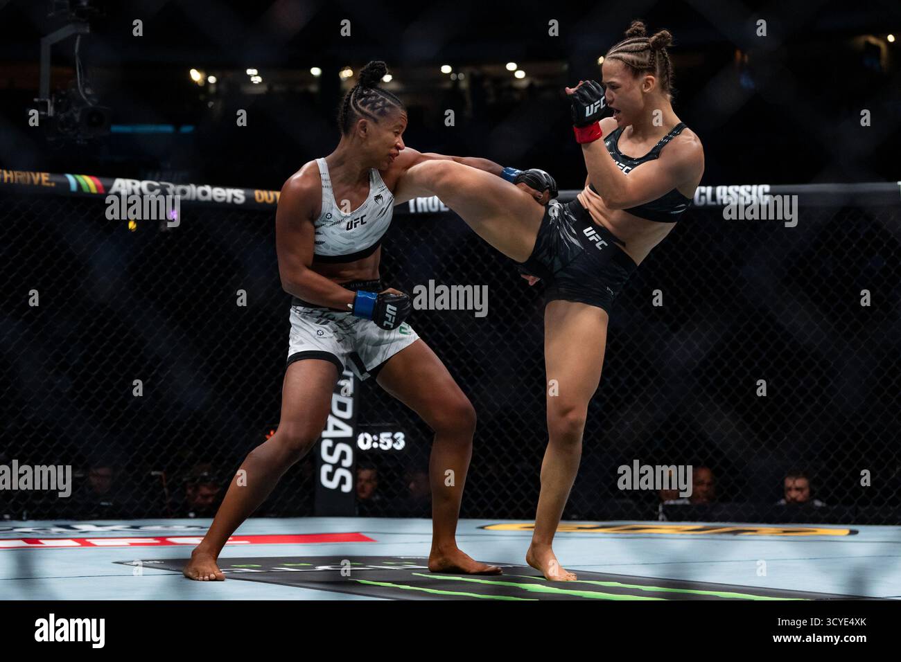 Stephanie Luciano, right, kicks Ravena Oliveira, left, during a women's ...