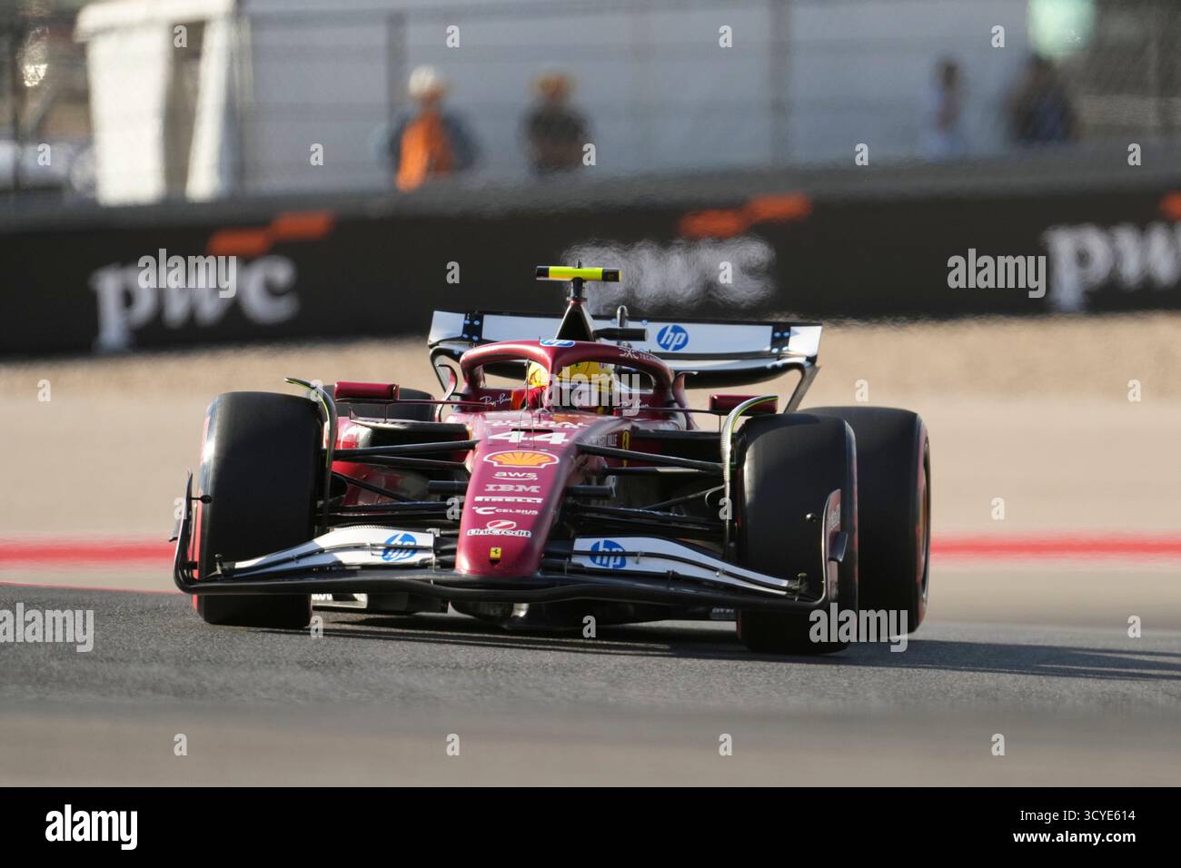 Ferrari driver Lewis Hamilton of Britain steers his car during the ...
