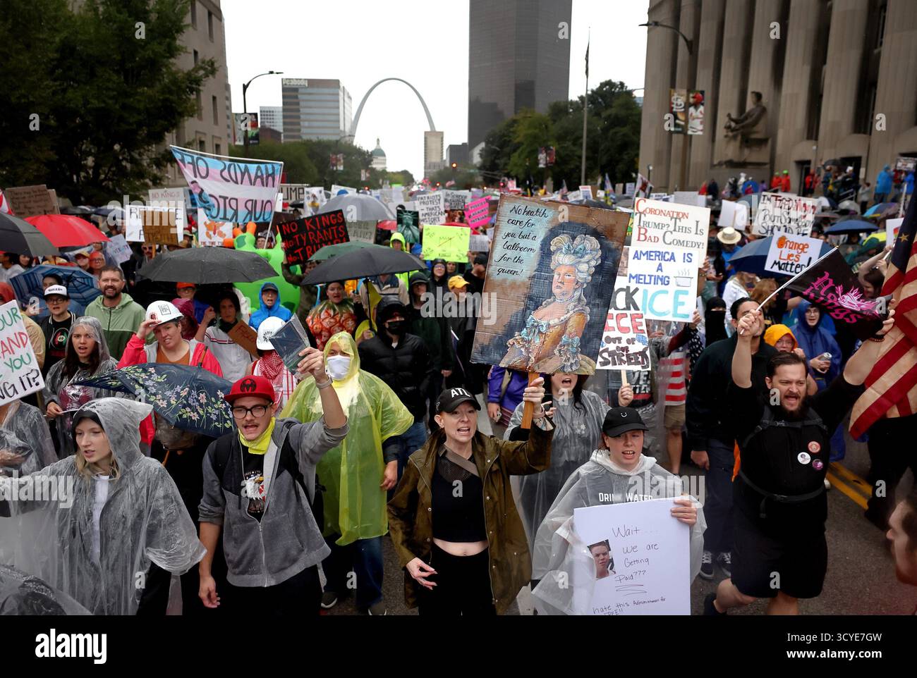 Demonstrators march down Market Street during the "No Kings" protest in ...