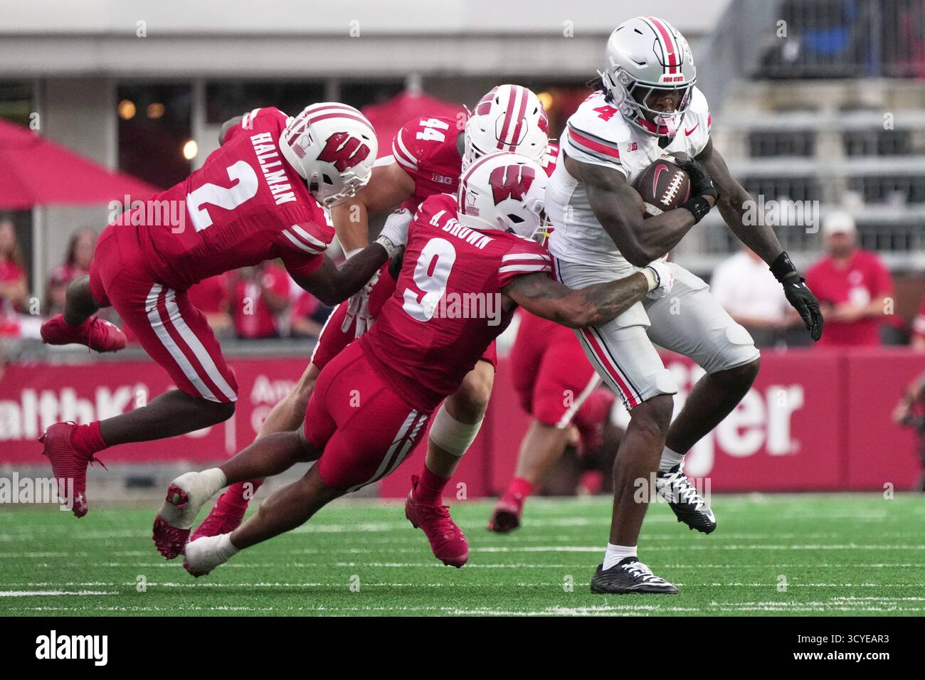 Ohio State's Jeremiah Smith tries to get past Wisconsin's Trech ...