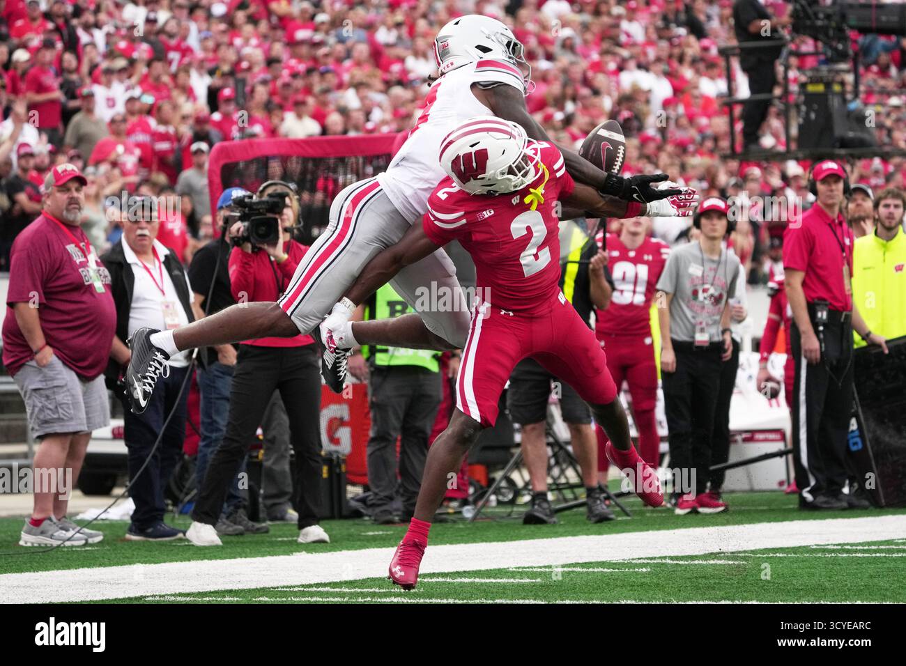 Wisconsin's Ricardo Hallman breaks up a pass intended for Ohio State's ...