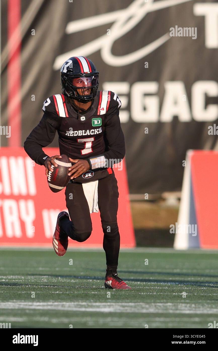 October 18, 2025: Ottawa Redblacks quarterback Tyrie Adams (7) drops ...