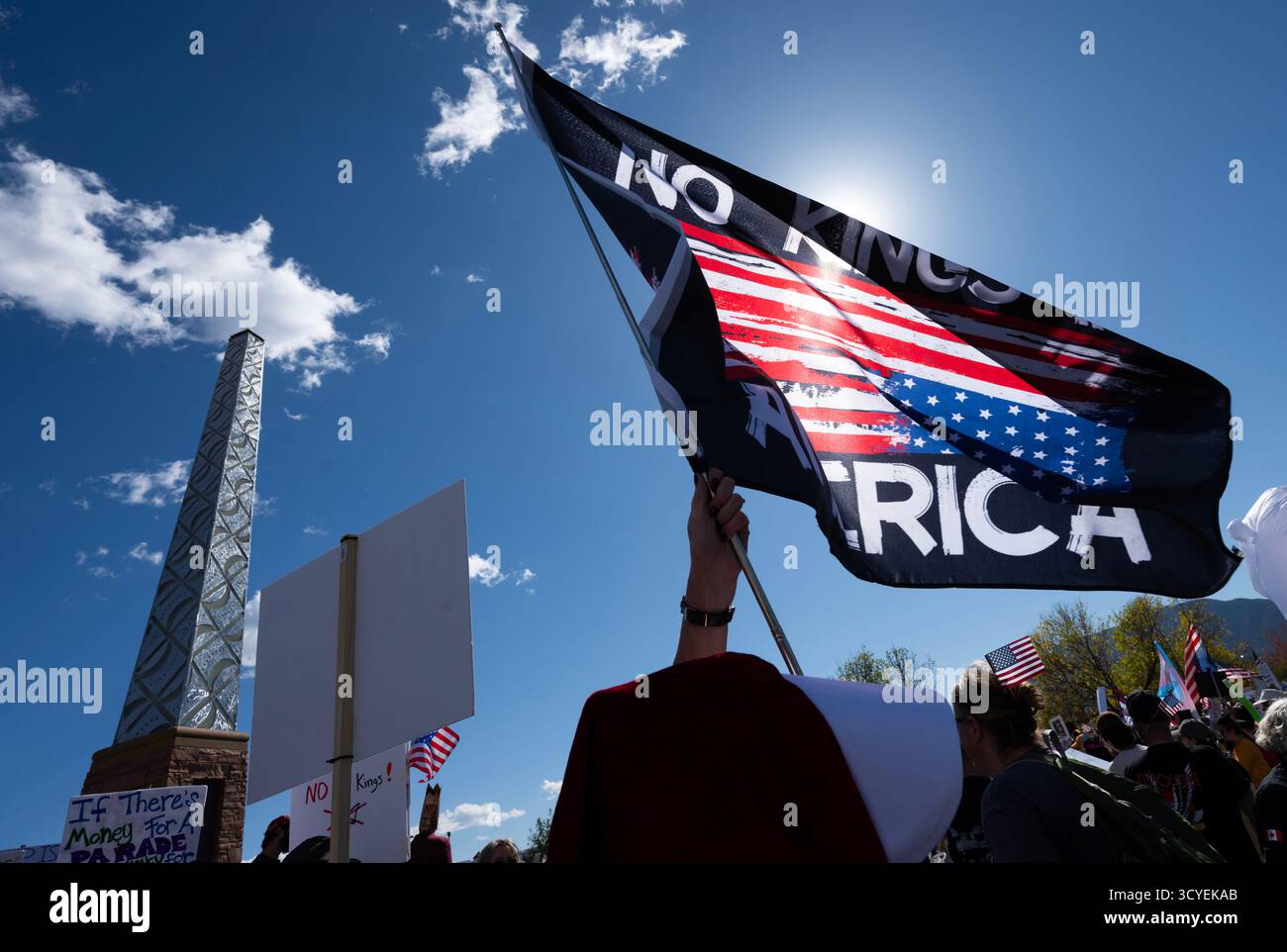A protester holds an "No Kings" during the nationwide "No Kings ...