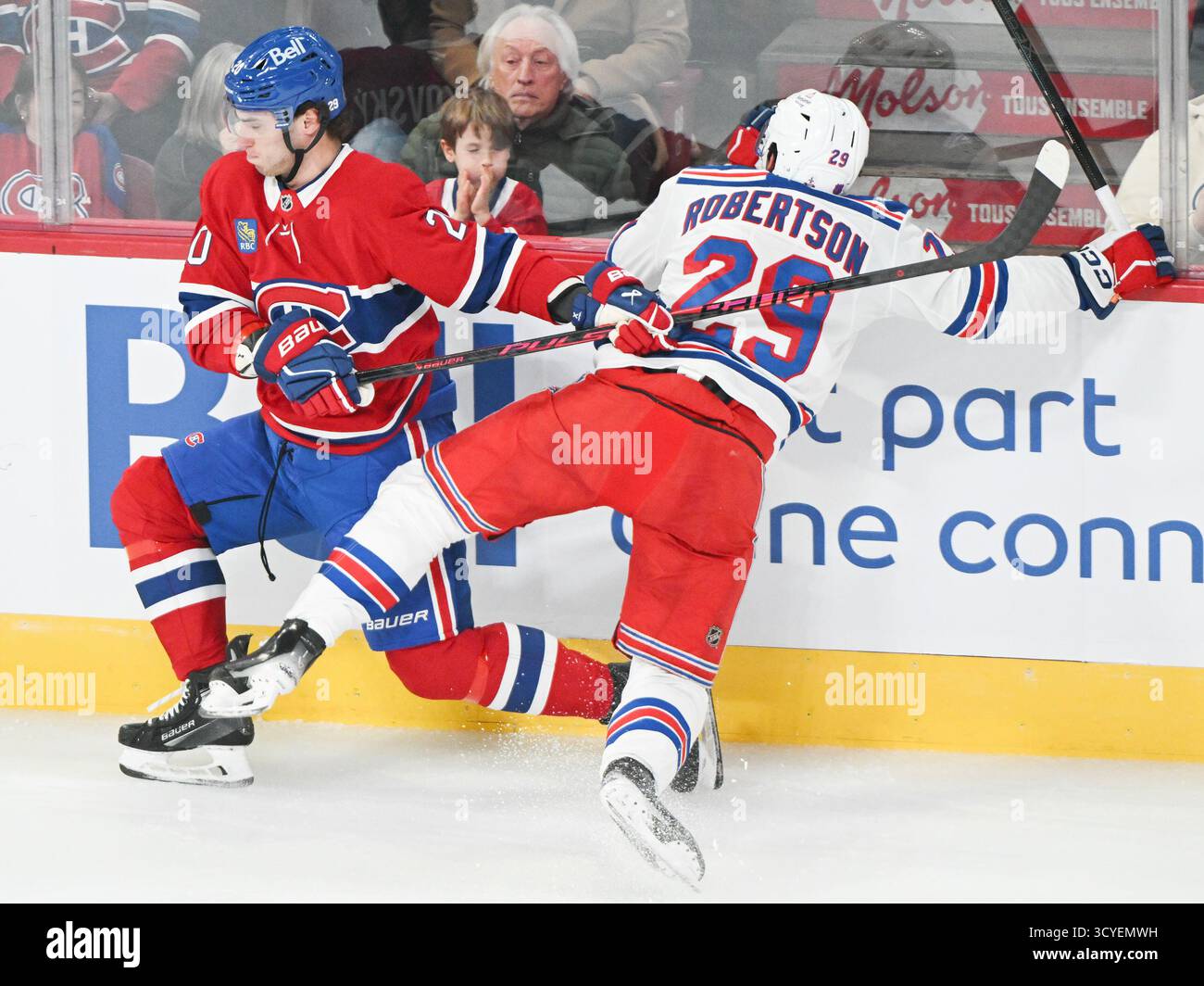 Montreal Canadiens' Juraj Slafkovsky (20) and New York Rangers' Matthew ...