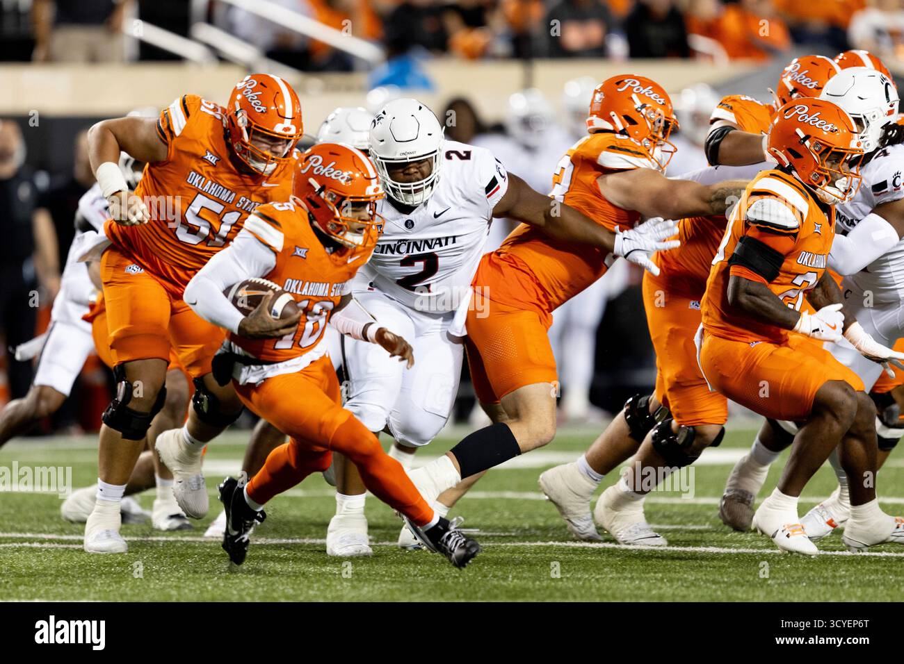 Cincinnati defensive lineman Dontay Corleone (2) chases down Oklahoma ...