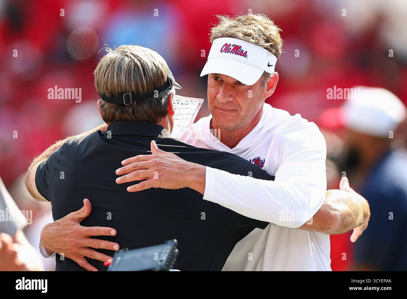 Georgia head coach Kirby Smart, left, and Mississippi head coach Lane ...