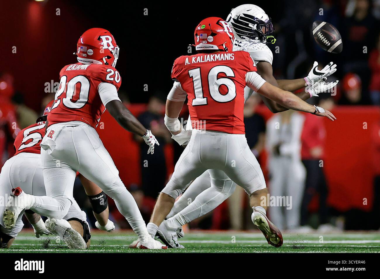 Oregon linebacker Blake Purchase intercepts a pass in front of Rutgers ...