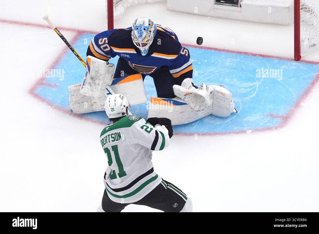 Dallas Stars' Jason Robertson (21) shoots wide of St. Louis Blues ...