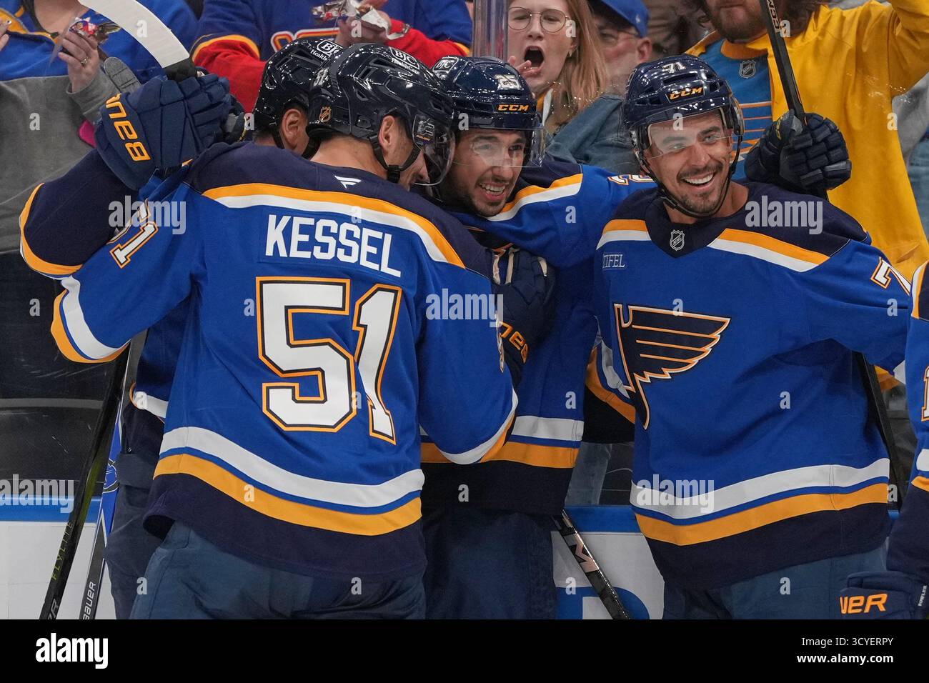 St. Louis Blues' Jordan Kyrou, center, is congratulated by Matthew ...