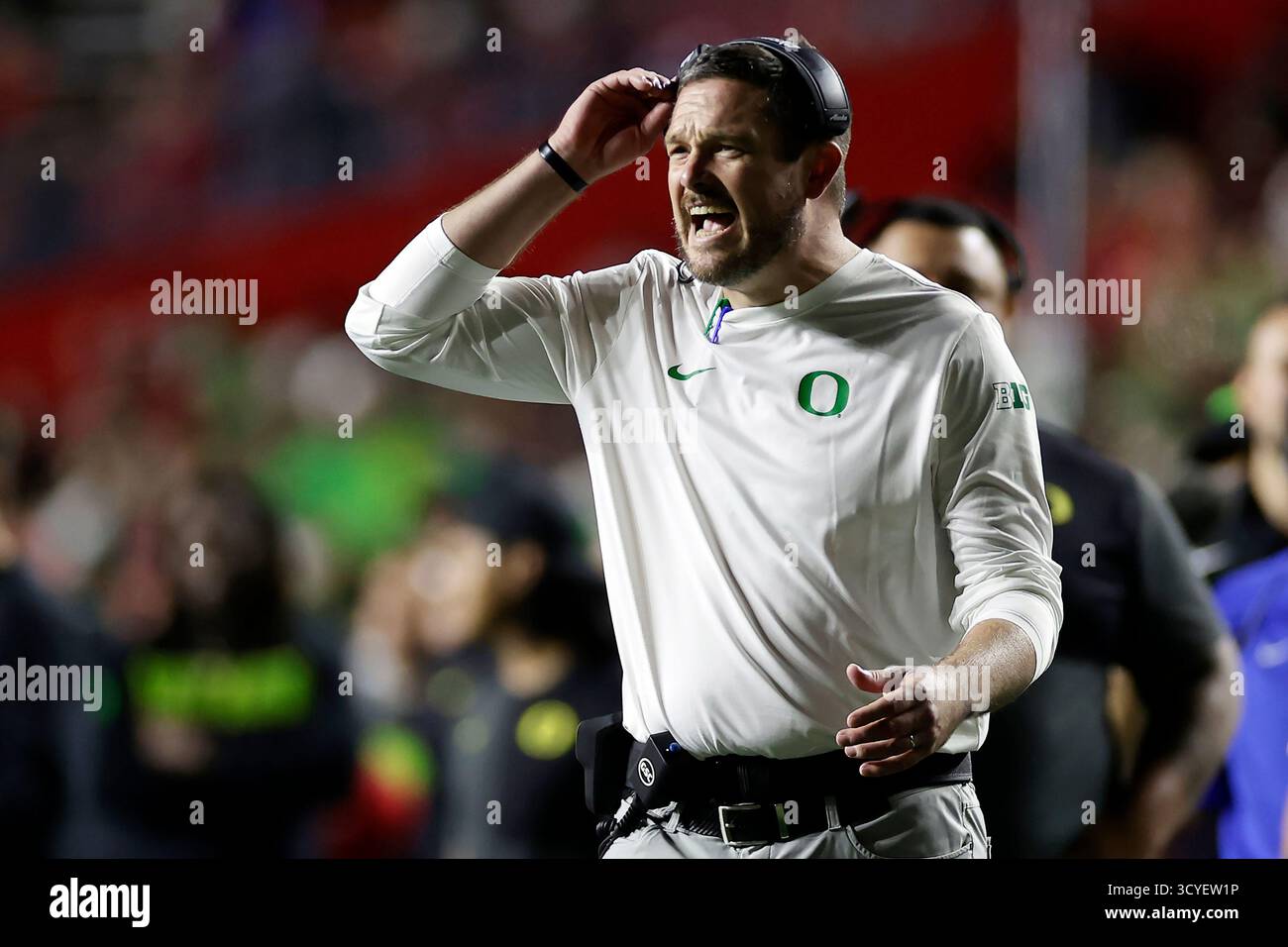 Oregon head coach Dan Lanning reacts during the first half of an NCAA ...