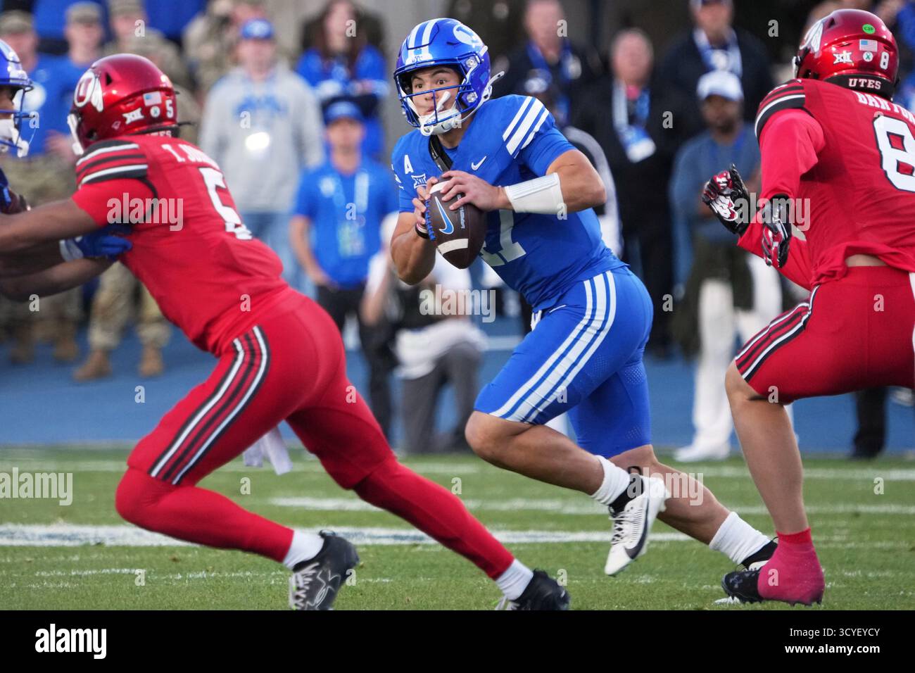 BYU quarterback Bear Bachmeier (47) rolls out to pass as Utah ...