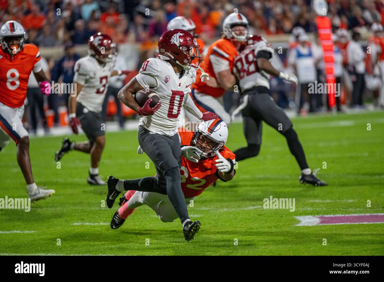 Virginia linebacker Landon Danley (32) tackles Washington State wide ...