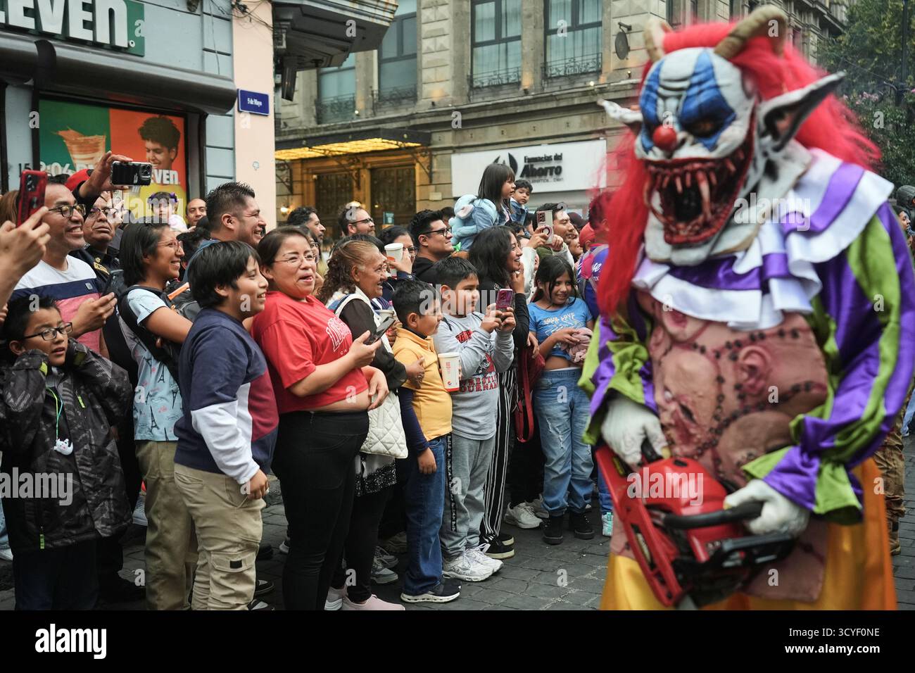 People attend the annual Zombie Walk in Mexico City, Saturday, Oct. 18 ...