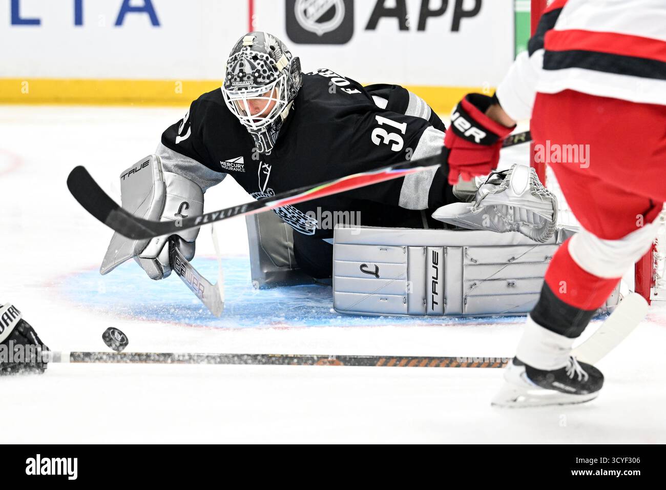 Los Angeles Kings goaltender Anton Forsberg (31) makes a save against ...