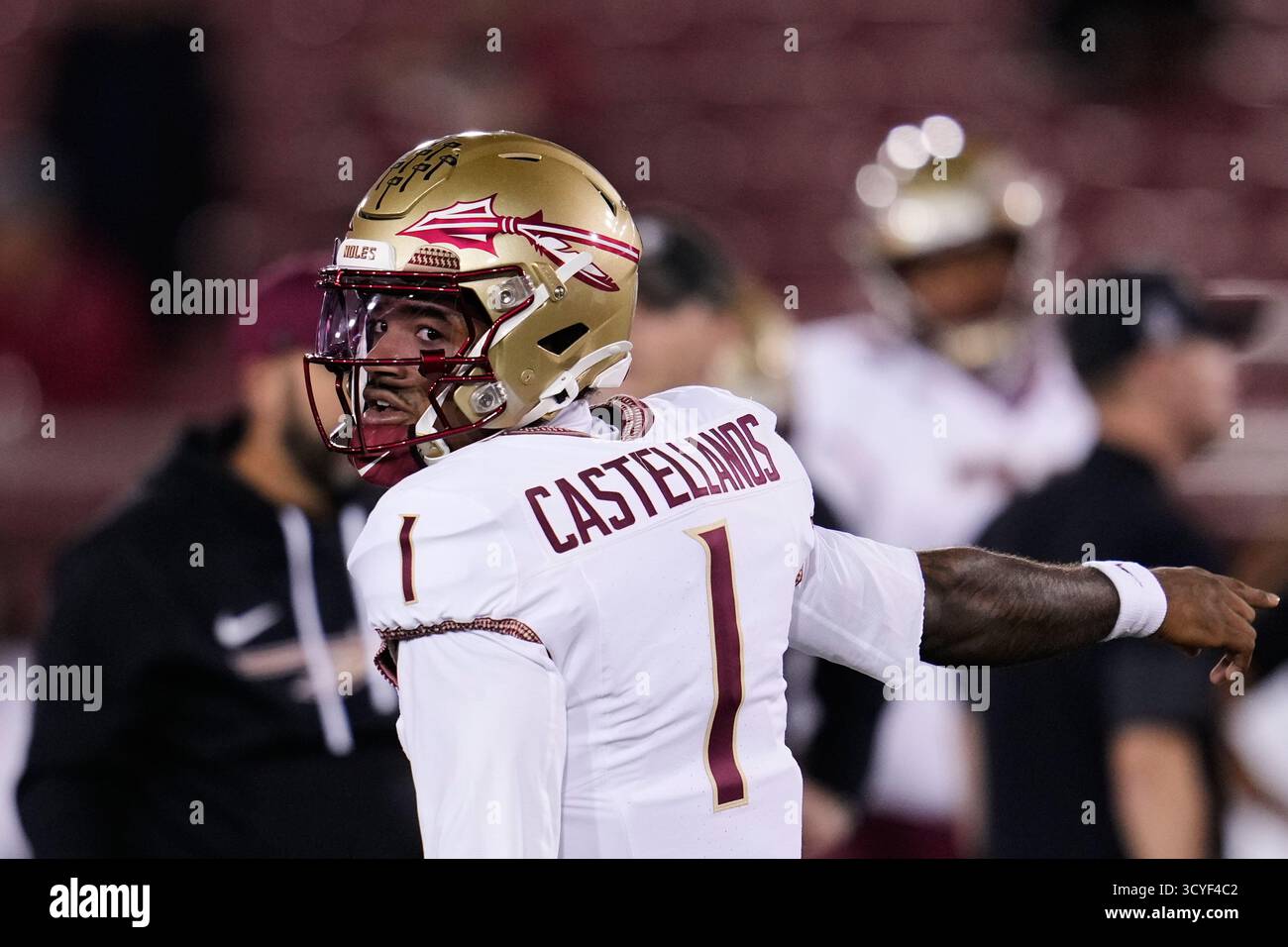 Florida State quarterback Tommy Castellanos warms up before an NCAA ...