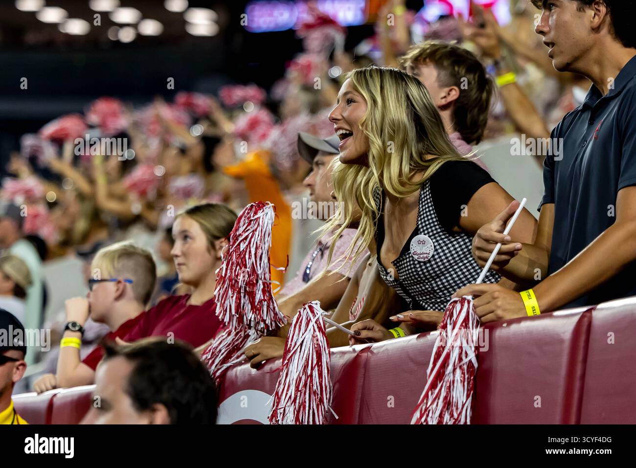 Alabama fans cheer during the first half of an NCAA college football ...