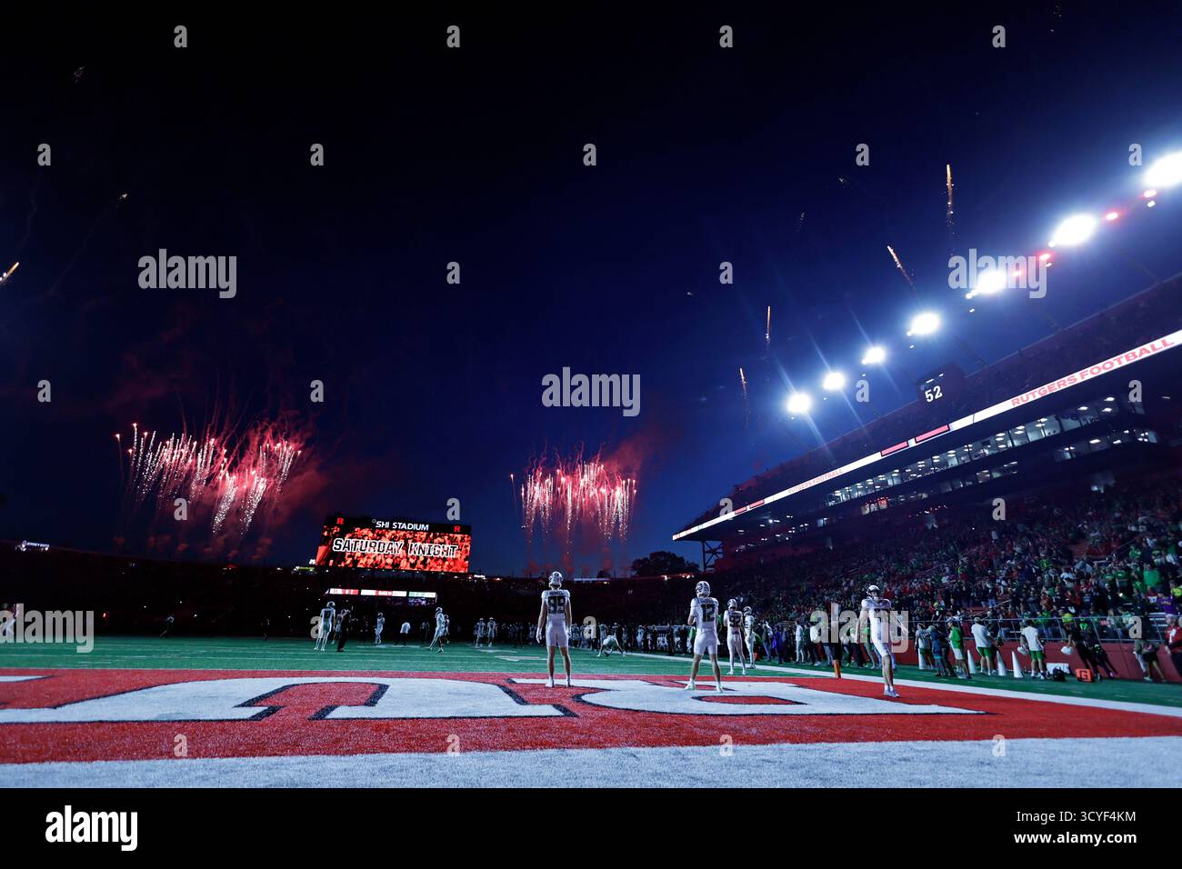 Fireworks explode as Oregon warms up before the first half of an NCAA ...