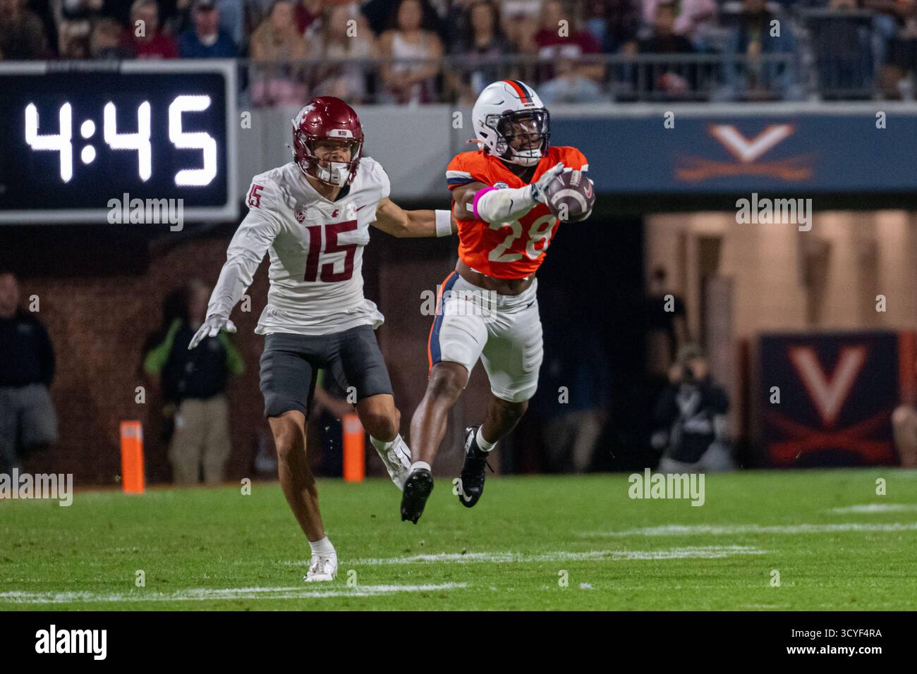 Virginia defensive back Donavon Platt (28) intercepts the ball in front ...