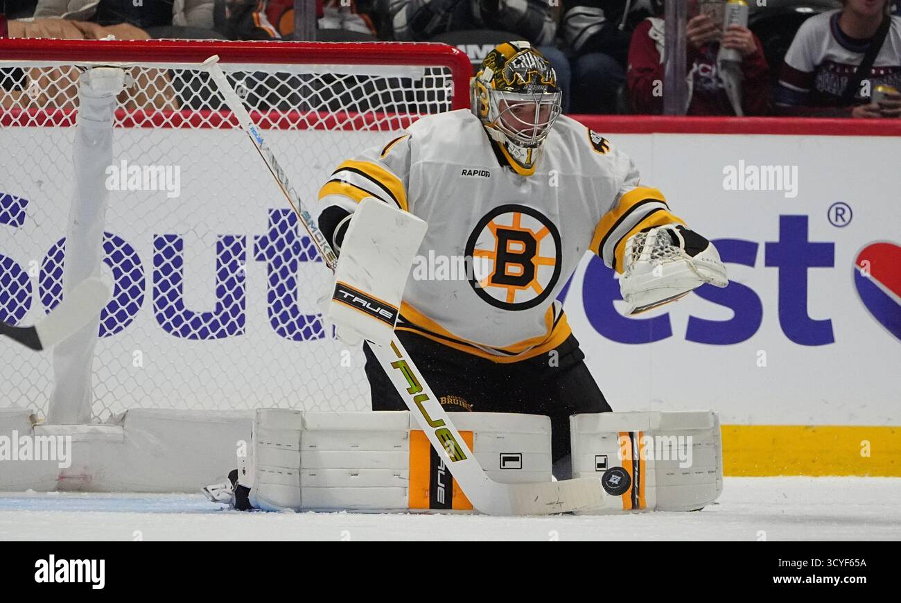 Boston Bruins goaltender Jeremy Swayman makes a stick-save in the ...