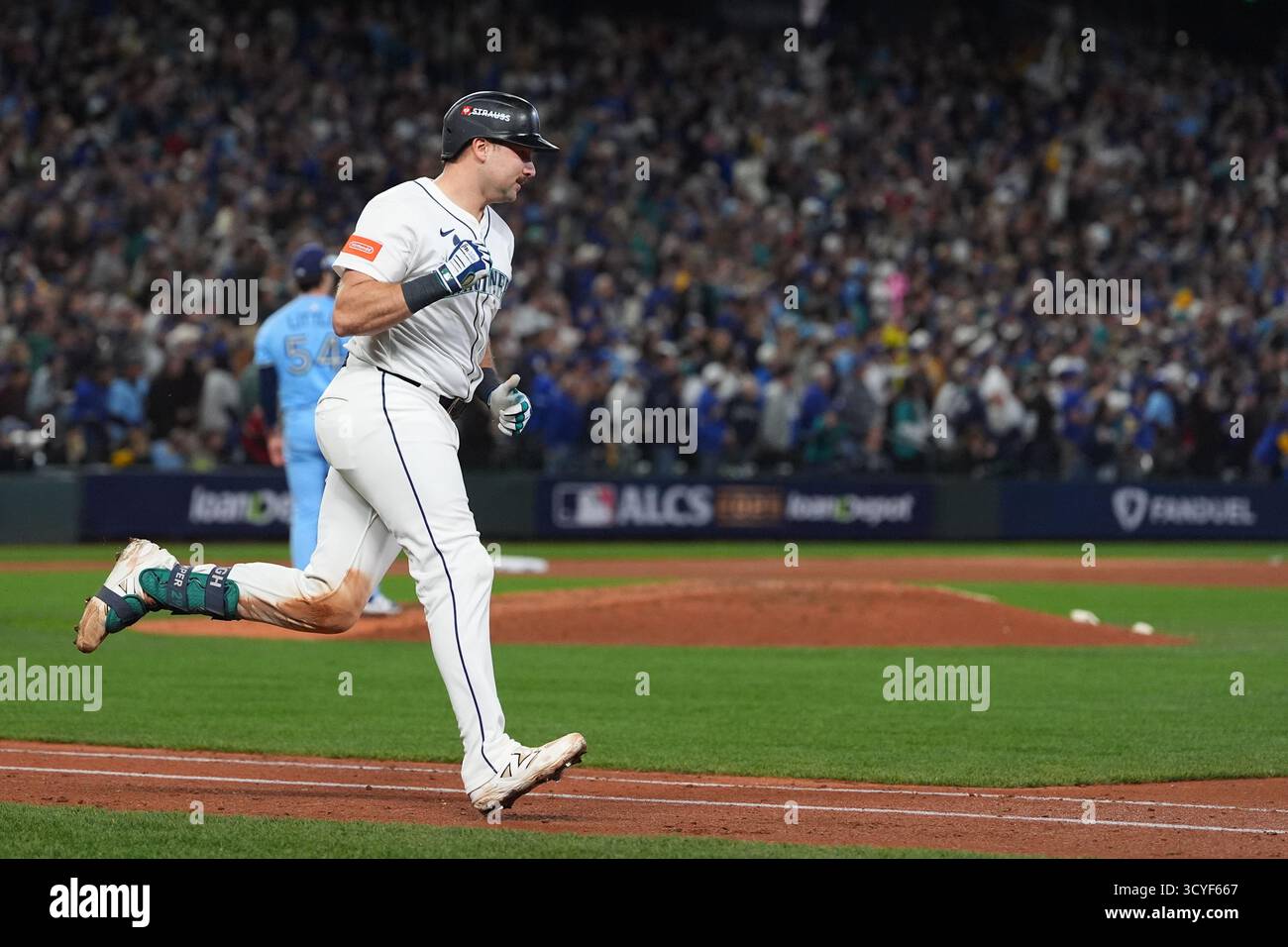 Seattle Mariners' Cal Raleigh runs the bases after hitting a solo home ...