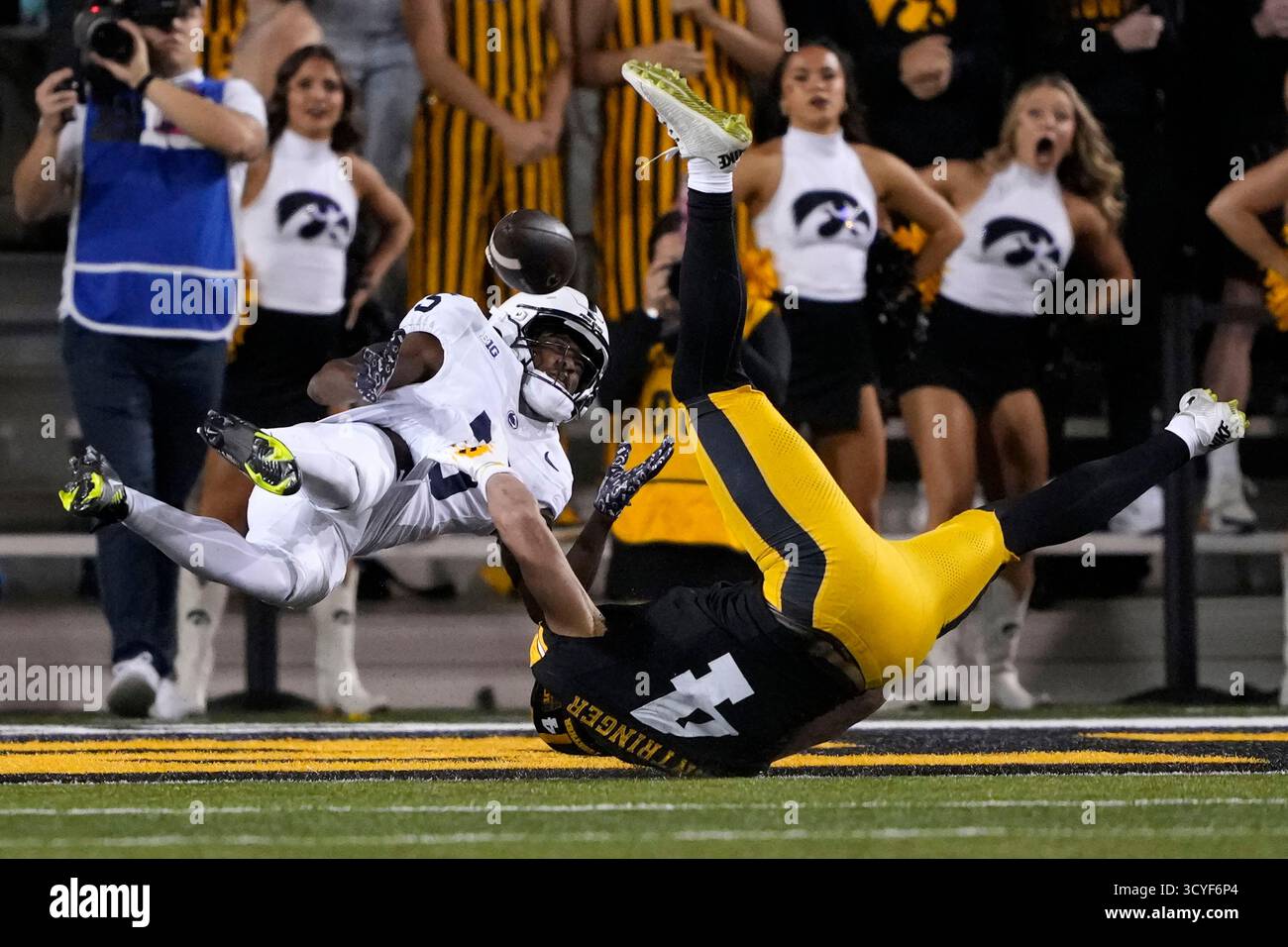 Iowa defensive back Koen Entringer (4) breaks up a pass intended for ...