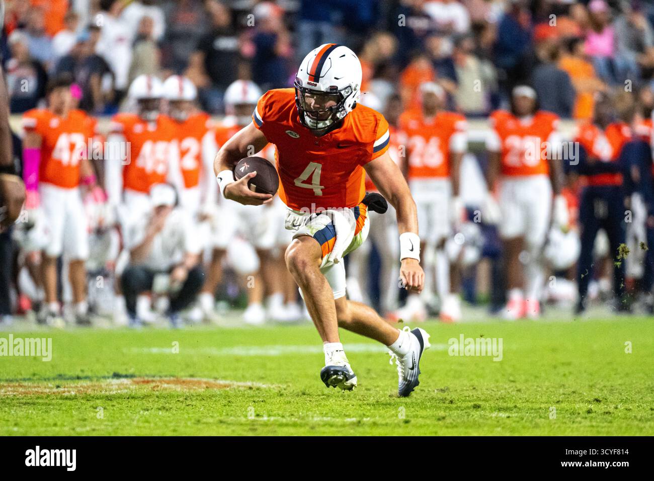 Virginia quarterback Chandler Morris (4) runs for a big gain late in ...
