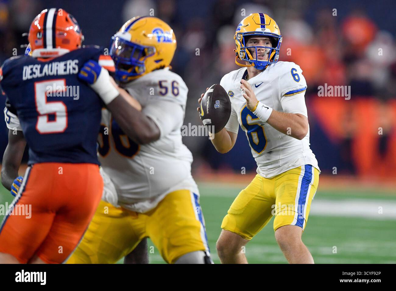Pittsburgh quarterback Mason Heintschel (6) looks to pass as offensive ...