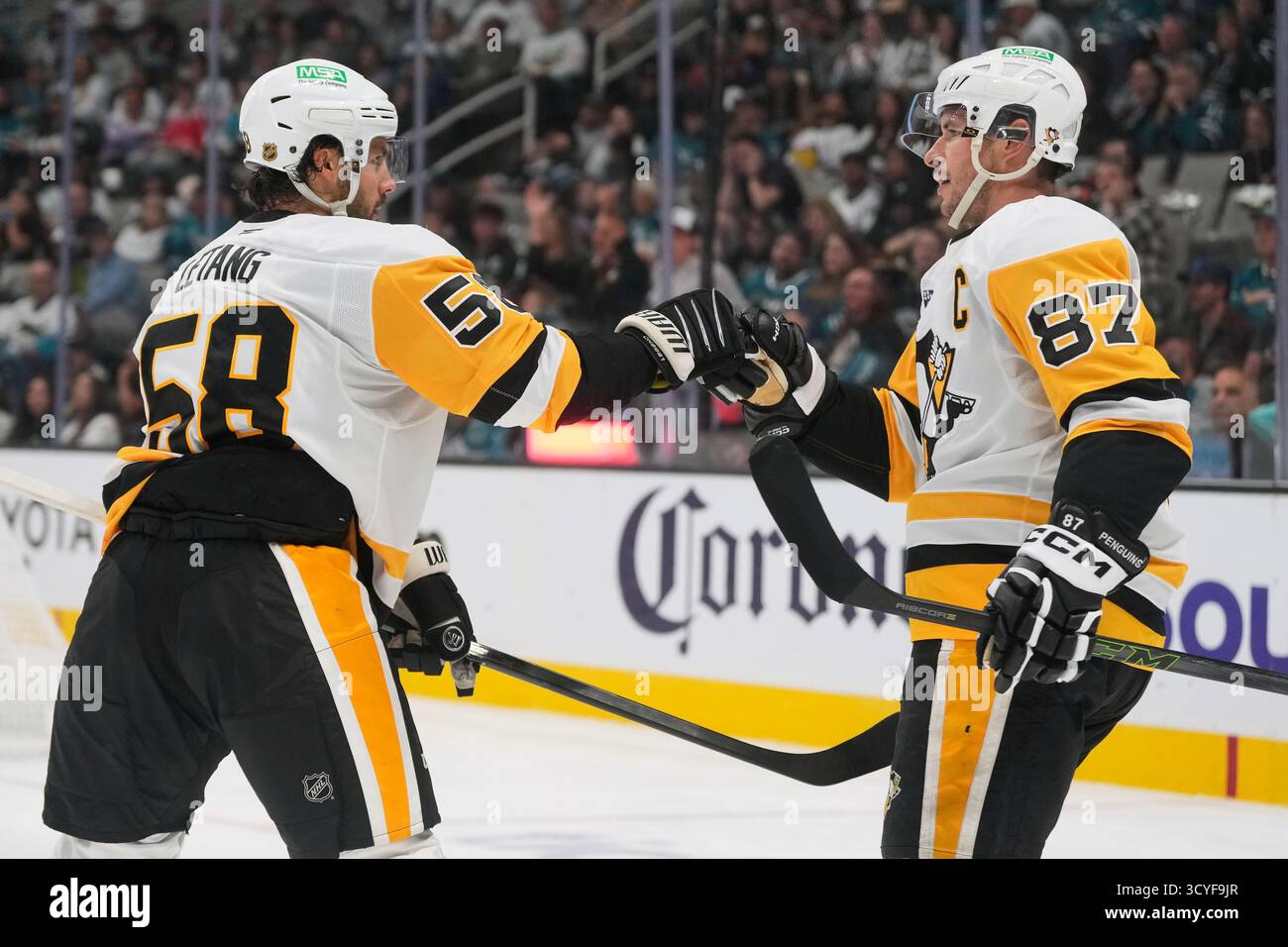 Pittsburgh Penguins center Sidney Crosby (87) is congratulated by ...
