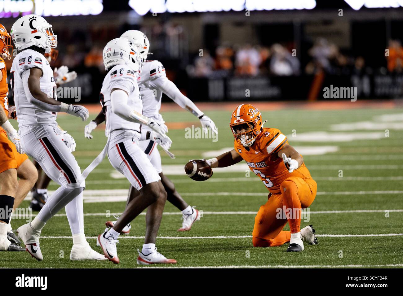 Oklahoma State running back Sesi Vailahi (3) celebrates after getting a ...