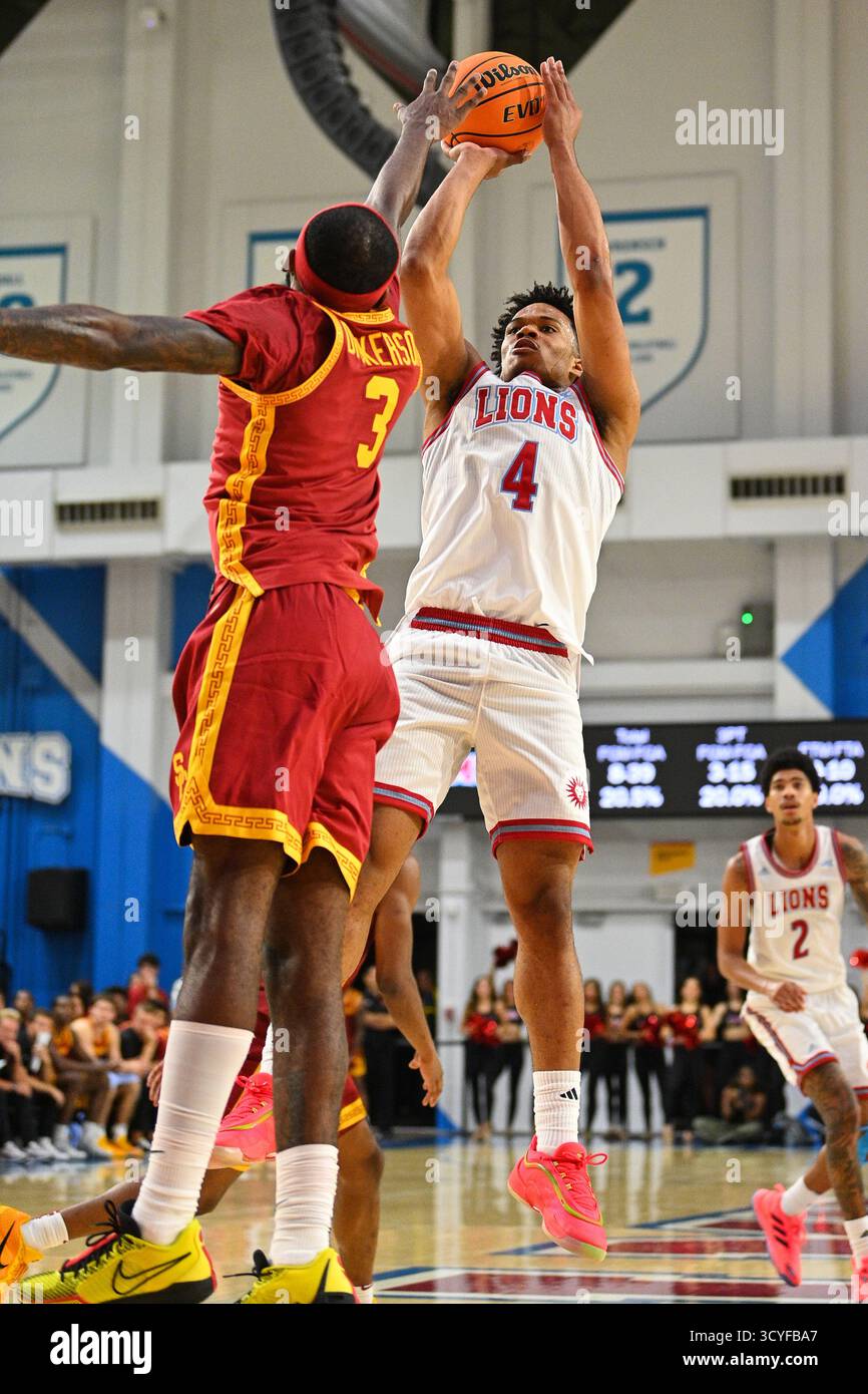 LOS ANGELES, CA - OCTOBER 18: LMU Lions guard AJ Thomas (4) shoots over ...