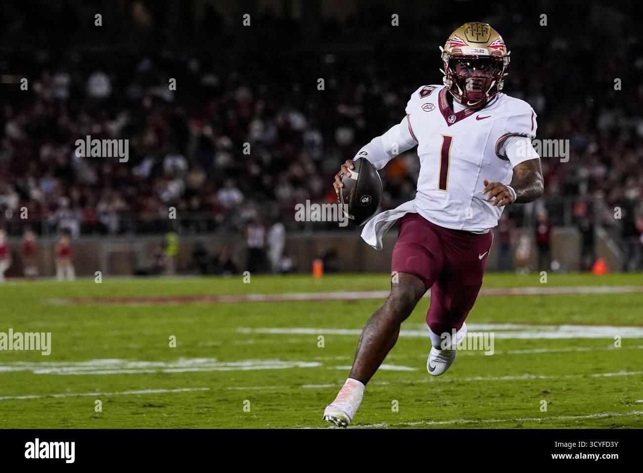 Florida State quarterback Tommy Castellanos runs with the ball during ...