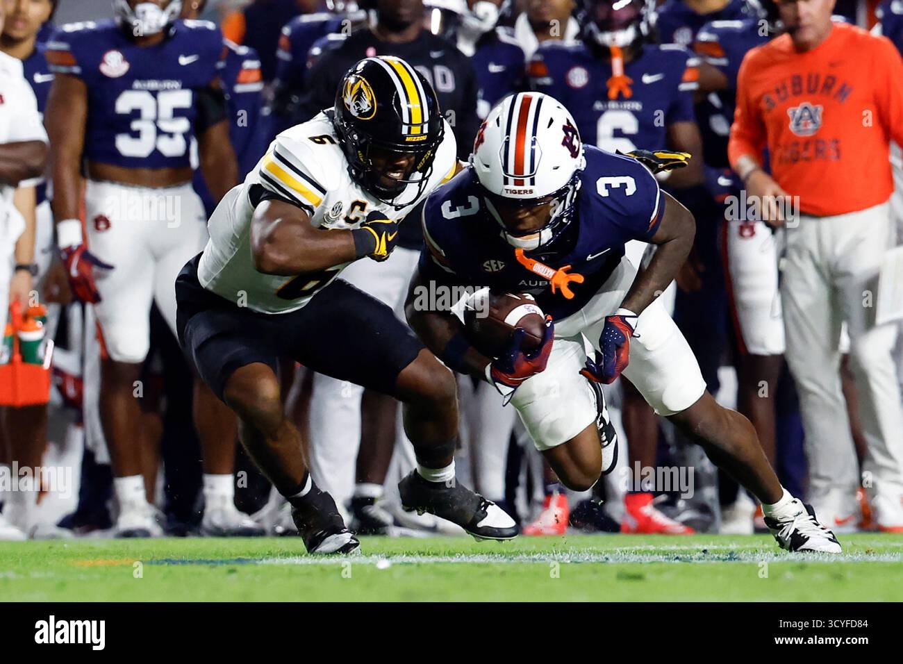 Auburn wide receiver Perry Thompson (3) carries for the first down as ...