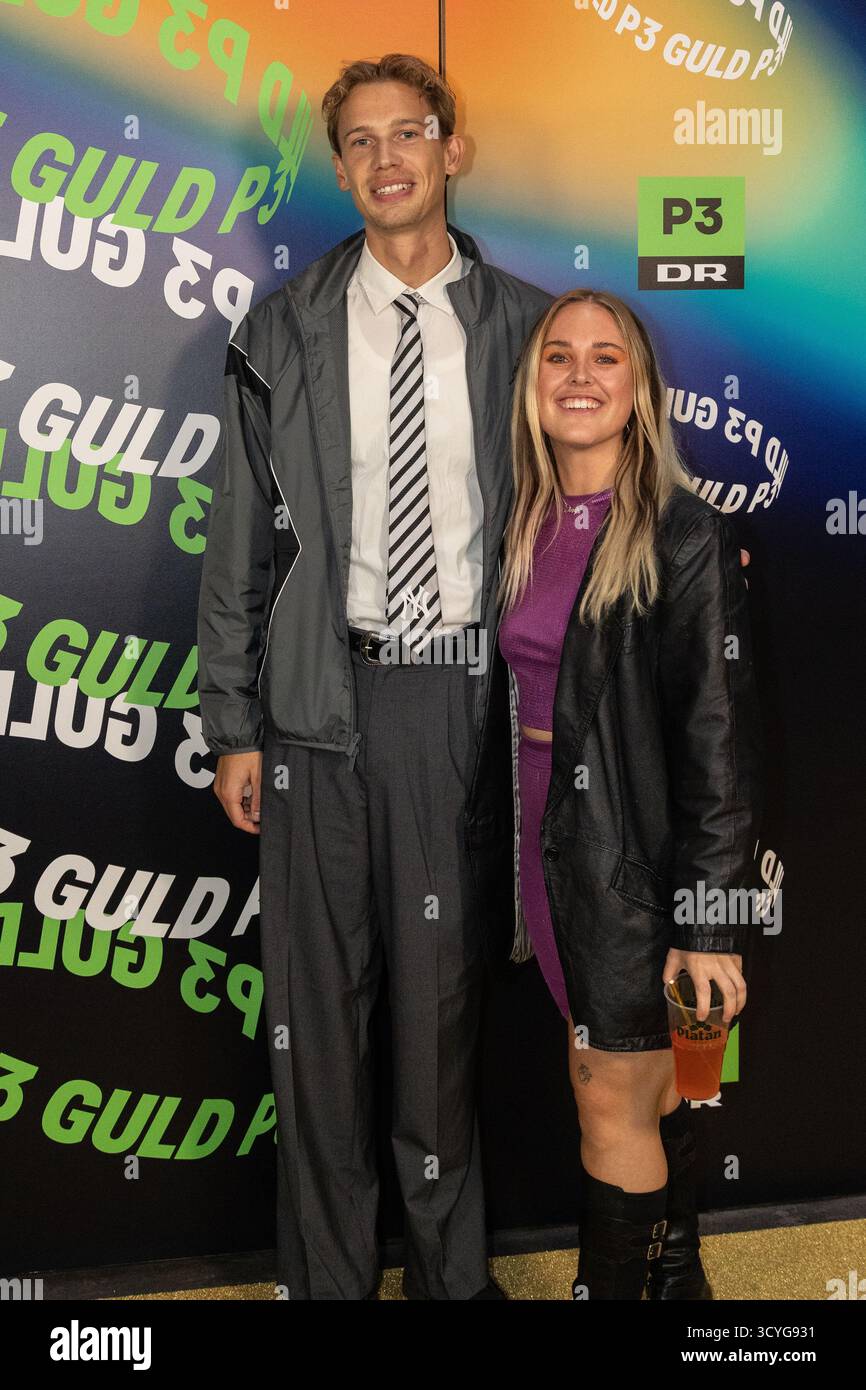 Kasper Reippurt (L) and Inge Thorup (R) arrive at the Golden Carpet of ...